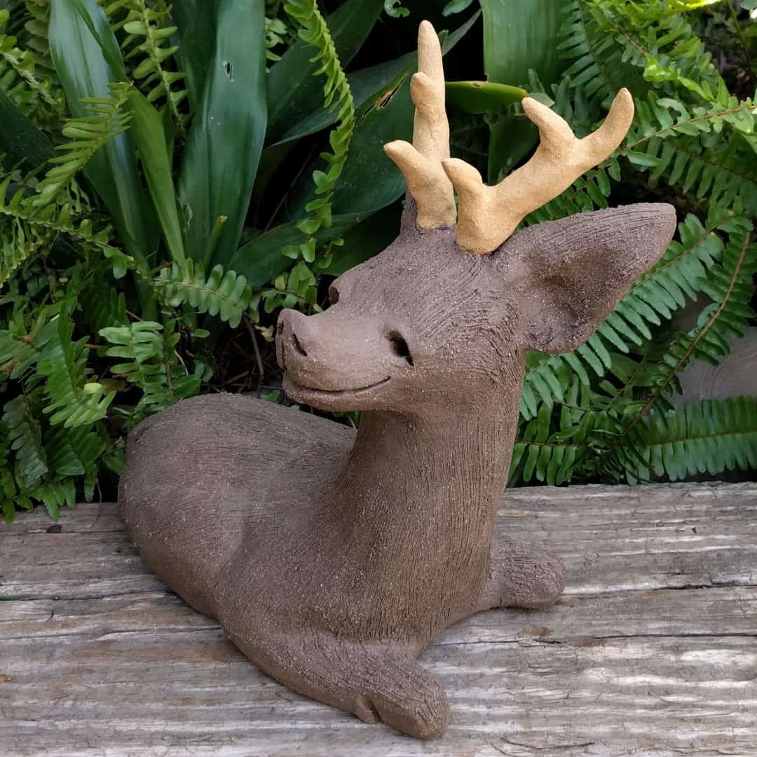Clay Sitting Stag Sculpture