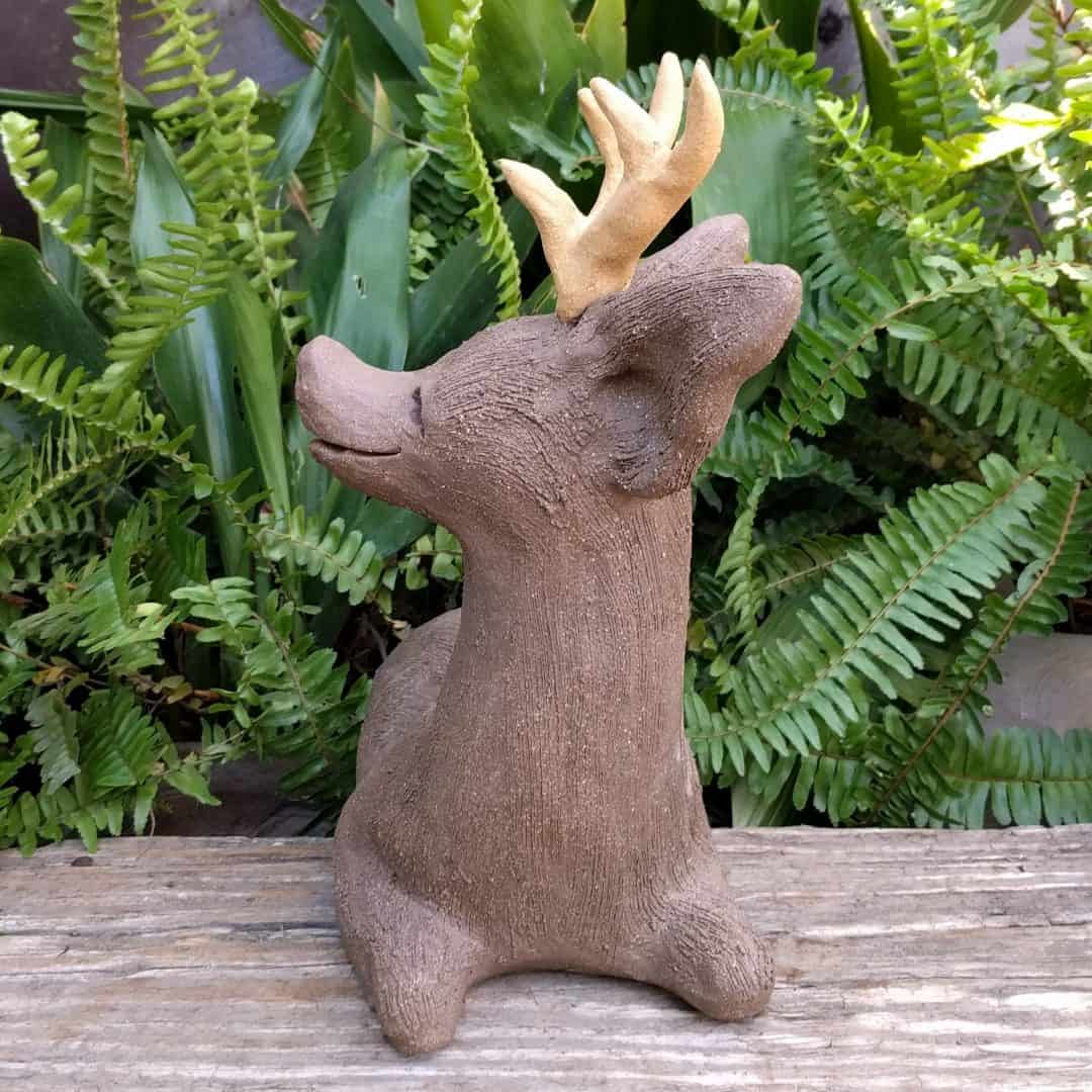 Clay Sitting Stag Sculpture